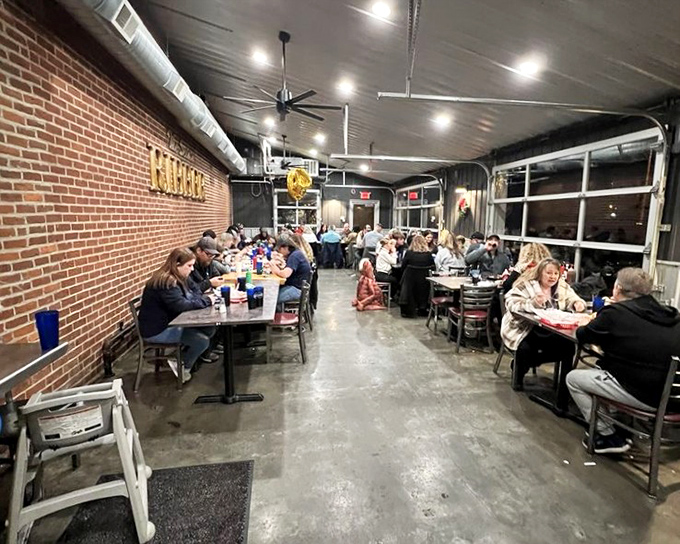 A full house of happy diners, all united in the universal language of "mmm" and "pass the napkins, please."