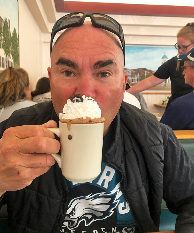 The restaurant's interior captures that moment when an Eagles fan discovered hot chocolate can wear whipped cream like a jaunty hat. Pure joy!