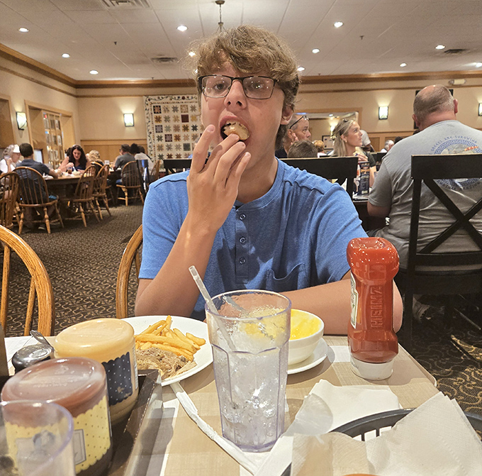 The dining room buzzes with the universal language of "mmm" as patrons experience the simple joy of food that doesn't need fancy descriptions.