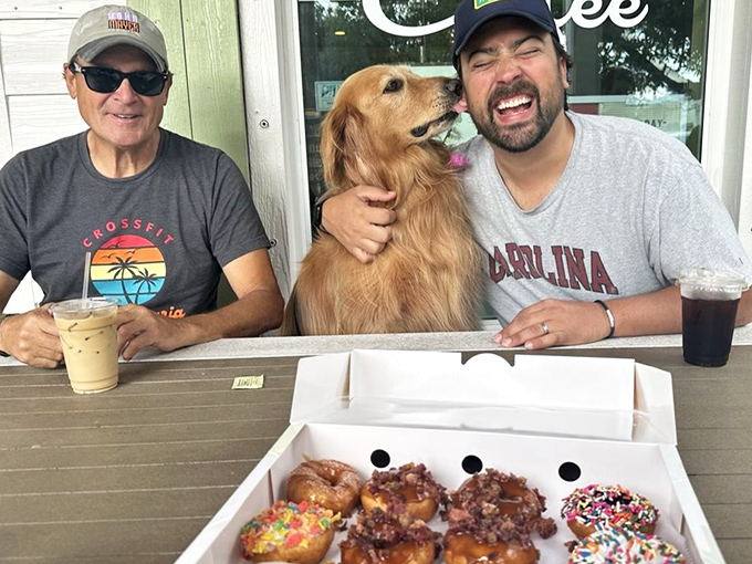 Even dogs know a good thing when they smell it. Man's best friend meets mankind's best breakfast in a moment of pure joy.