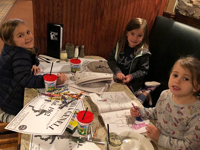 Family-friendly to the core, with crayons and coloring sheets that keep the kids happy while adults debate pizza philosophy.