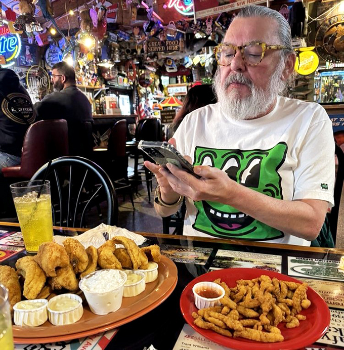 Even the patrons become part of the Tackle Box 2 experience, gathering around tables laden with fried treasures like it's a family reunion.