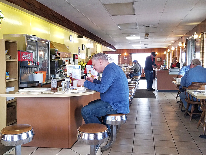 The counter seating &ndash; where strangers become neighbors and the coffee refills come with a side of local wisdom.