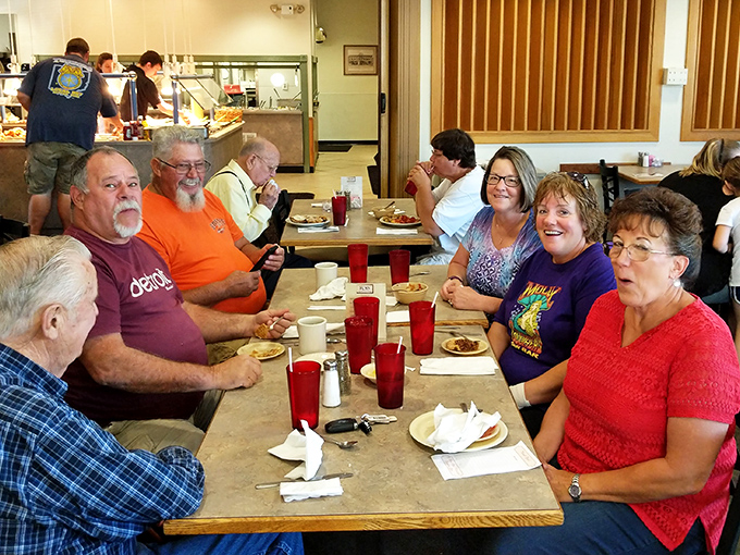 The true measure of a great restaurant: tables filled with smiling locals sharing stories over plates of food that keep them coming back week after week.
