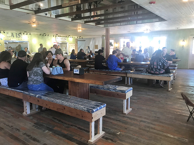 Communal tables where strangers become friends united by the universal language of "mmm" and "pass the sauce, please."