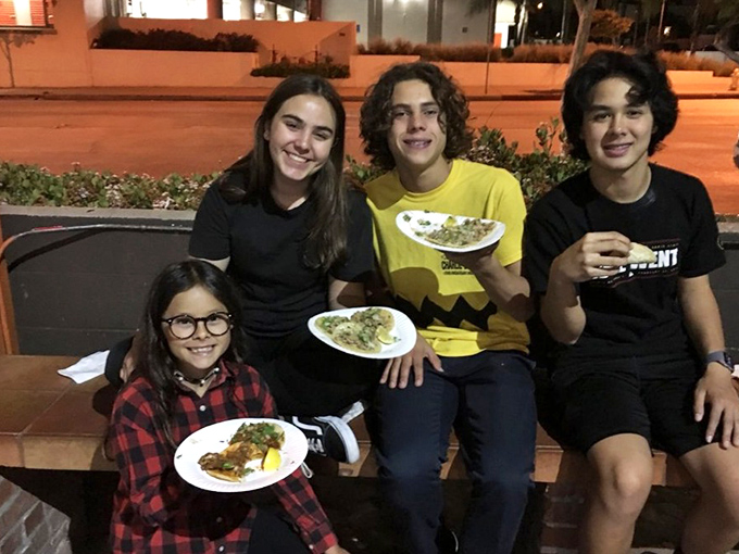 Nothing brings family together like great tacos—these kids know they're experiencing something more meaningful than just dinner.