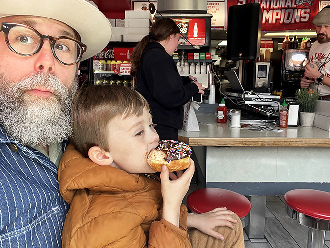 Passing donut wisdom down through generations&mdash;the proper sprinkle-to-bite ratio is serious business at Buckeye Donuts.
