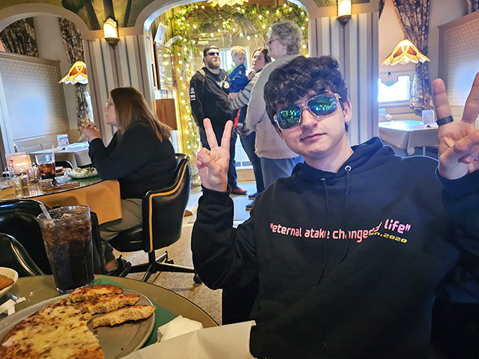 The dining room where memories are made between bites. Notice how nobody's looking at their phones? That's the power of good food.