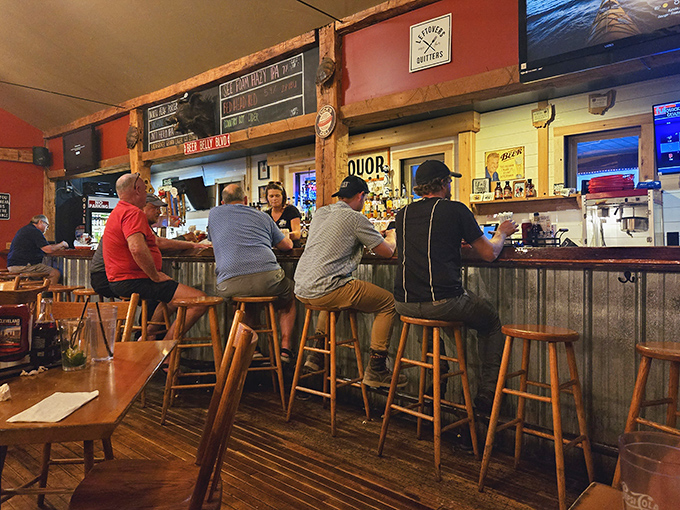 The bar at Lager Heads&mdash;where strangers become friends over pints and plates. That corrugated metal front has heard countless "mmms" of approval.