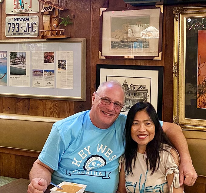 The wooden walls of The Fish House have witnessed countless vacation memories, serving as the backdrop for happy diners enjoying Florida's bounty.