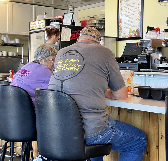 The true measure of a great diner: regulars who've claimed their territory at the counter, solving the world's problems one coffee refill at a time.