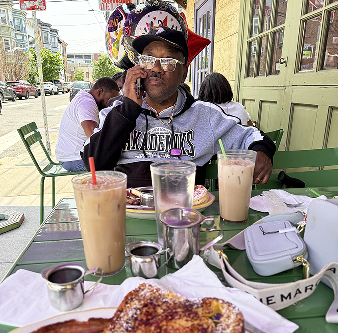 The outdoor seating area: where iced coffees meet morning sunshine and Philadelphia shows off its neighborhood charm between sips.