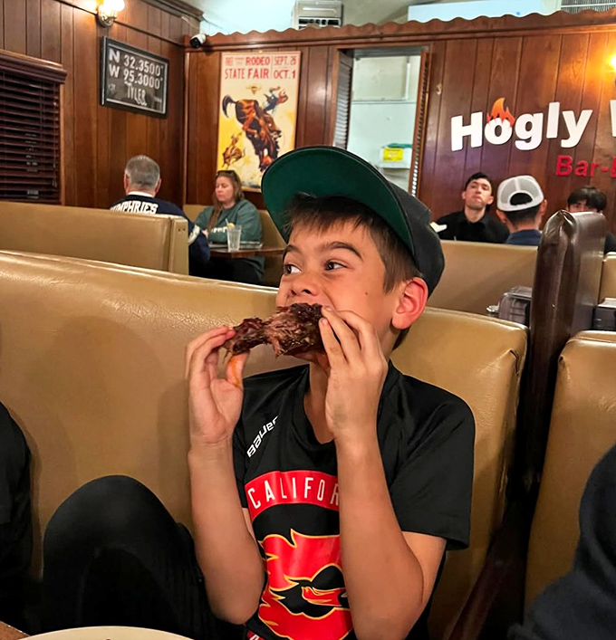 The look of pure joy that comes with that first bite of barbecue. Converting California kids into Texas BBQ believers, one rib at a time.