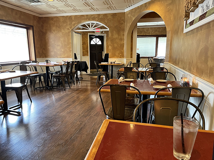 Arched doorways and warm lighting create dining rooms that feel like you've stepped into someone's home rather than a restaurant.