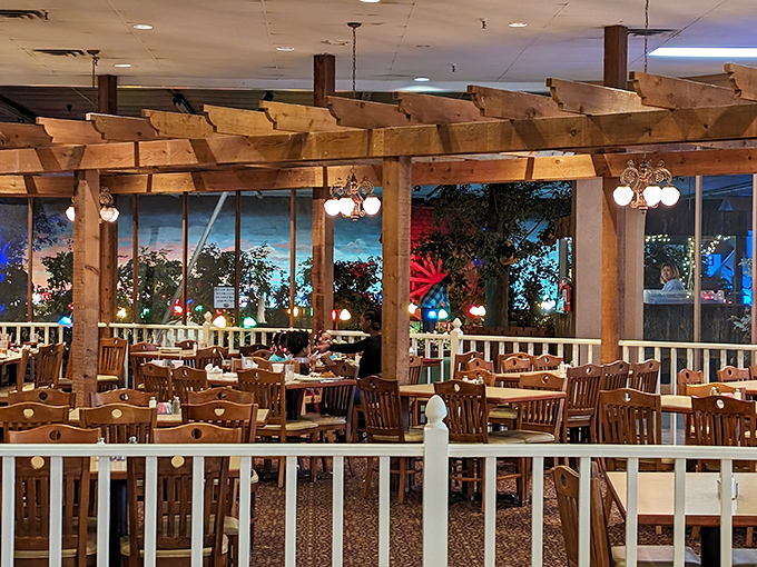 Wooden beams, pendant lighting, and a view of twinkling lights create the perfect rustic-yet-refined atmosphere for your buffet marathon.
