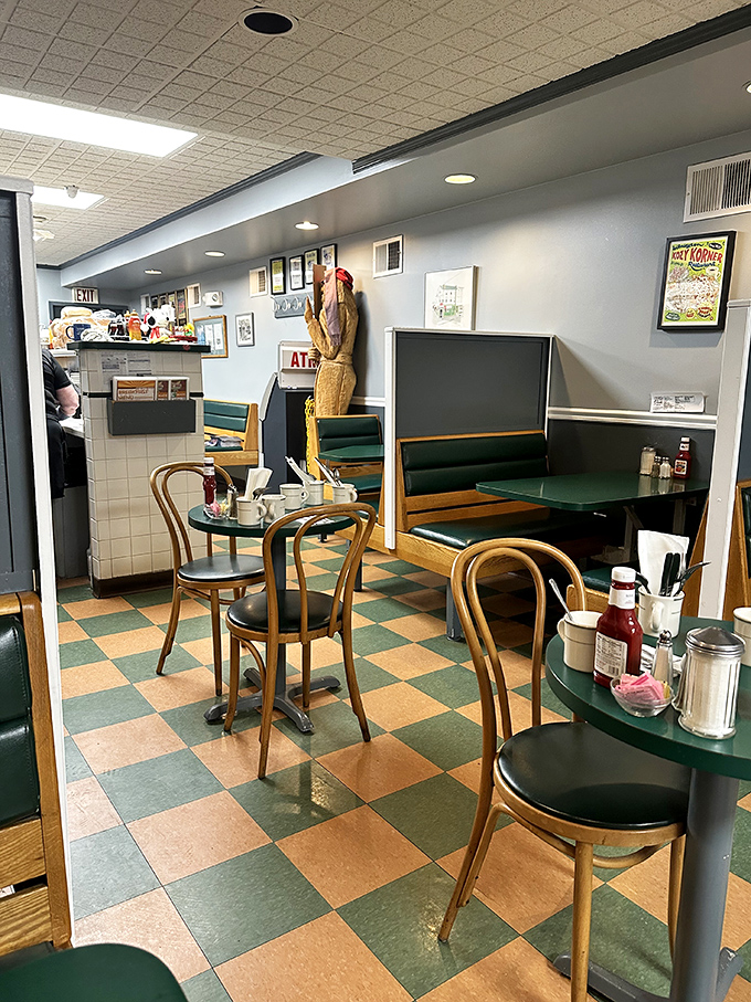 The dining area where strangers become neighbors over eggs and coffee. Notice the wooden chairs that have supported countless conversations.