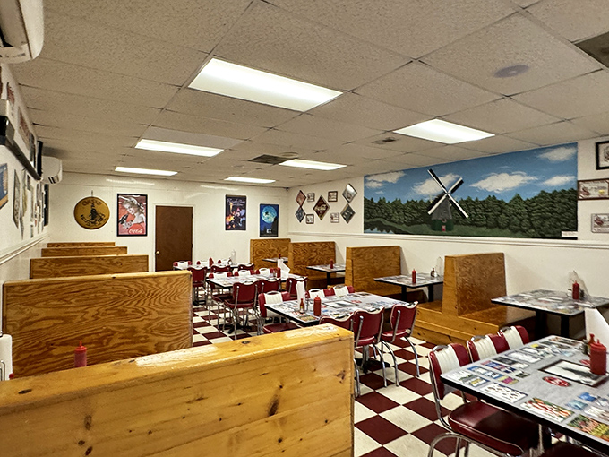 The checkered floor and wooden booths create the perfect backdrop for conversations that matter more than the food itself. Almost.