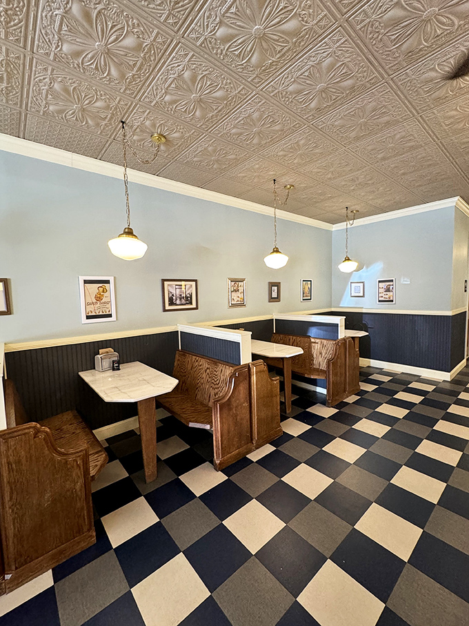These booths aren't just seating&mdash;they're front-row tickets to memory-making, with marble tables ready to support your elbow as you contemplate that last spoonful.