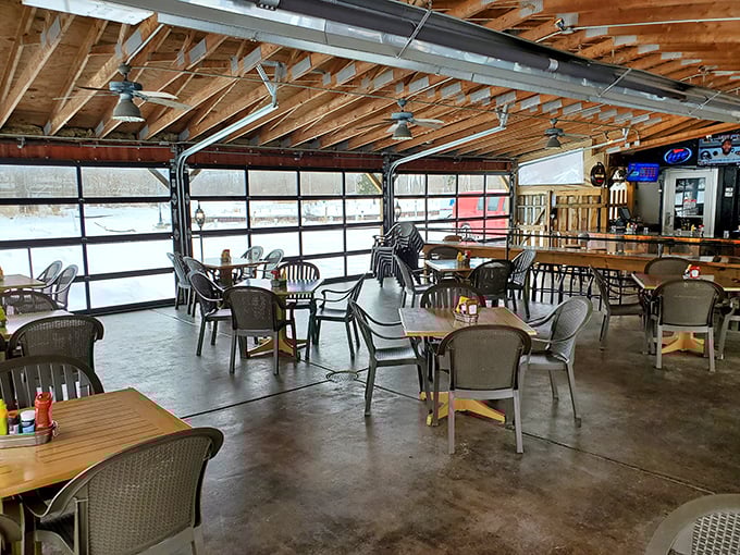 Winter dining with a view. Those garage doors will roll up come summer, but for now, the snow-covered scene makes every bite cozier.
