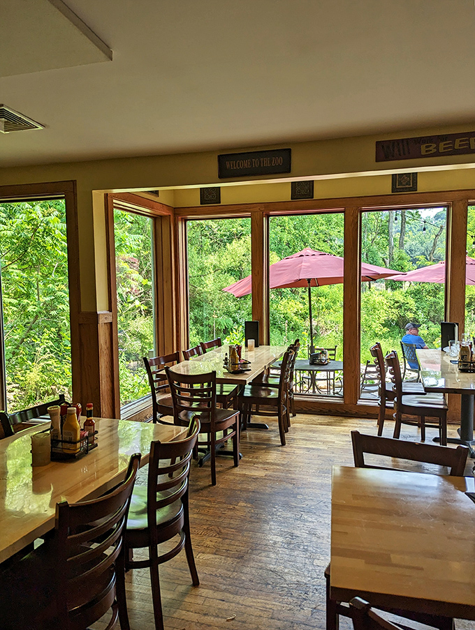 The dining room balances rustic charm with picture windows that turn Ohio's natural beauty into living artwork for every table.