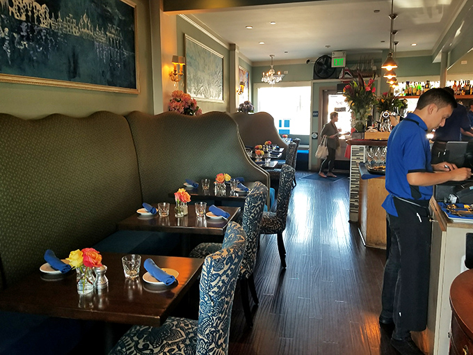 The dining area balances elegance and comfort&mdash;like your fancy living room, but with better food and no dishes to wash.