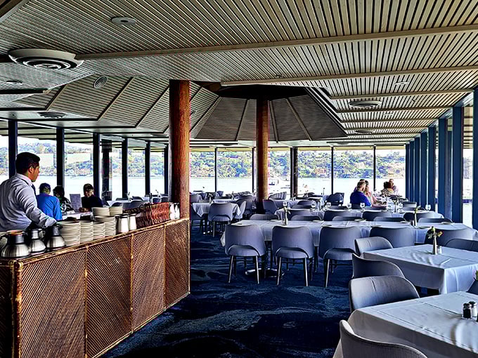 The dining room's wooden beams and blue carpeting create a nautical vibe without veering into "someone hung fishing nets on the wall" territory.