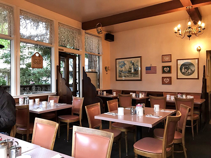The dining room hums with anticipation as patrons engage in the sacred ritual of deciding between waffles and benedicts.