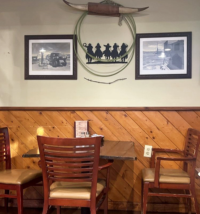 Western art and diagonal wood paneling create the perfect backdrop for meat-induced euphoria &ndash; like dining in a cowboy's dream living room.