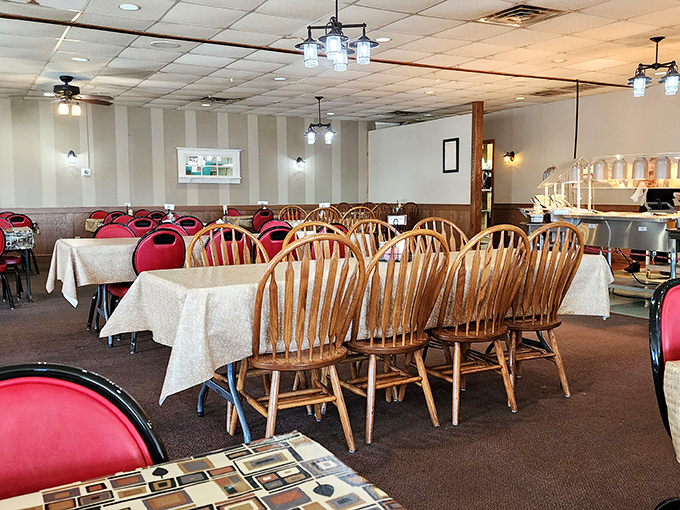 Simple wooden chairs and tables create a dining room where the focus remains squarely where it should be&mdash;on the plate in front of you.
