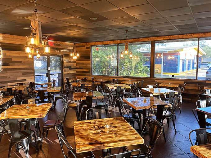Tables waiting for conversations to unfold, each wooden surface telling stories of celebrations past and "did you taste that?" moments to come.
