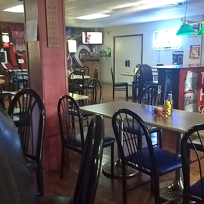 Where conversations flow as easily as the drinks. The dining area's unpretentious charm makes everyone feel like a regular.