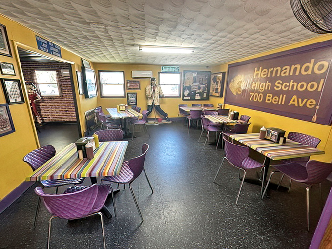 Purple chairs and yellow walls create a dining room that's part high school spirit, part time machine &ndash; comfort food deserves comfortable surroundings.