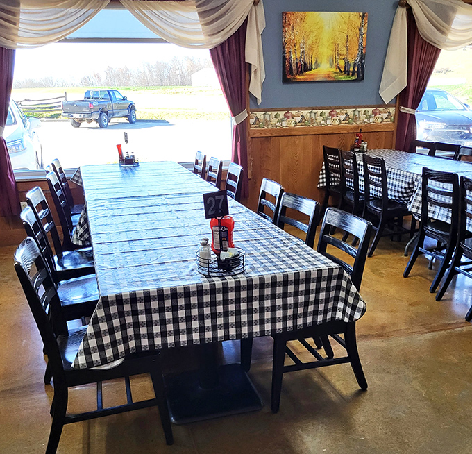 Long tables by sunlit windows create the perfect backdrop for family gatherings where memories are made between bites of homestyle cooking.
