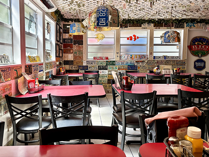 Every inch of wall space tells a story in this dining room. It's like eating inside a Florida Keys time capsule with better food.