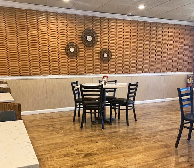 Wood paneling and decorative wall clocks—the universal language of "you're home now." This isn't interior design; it's a time machine to simpler days.