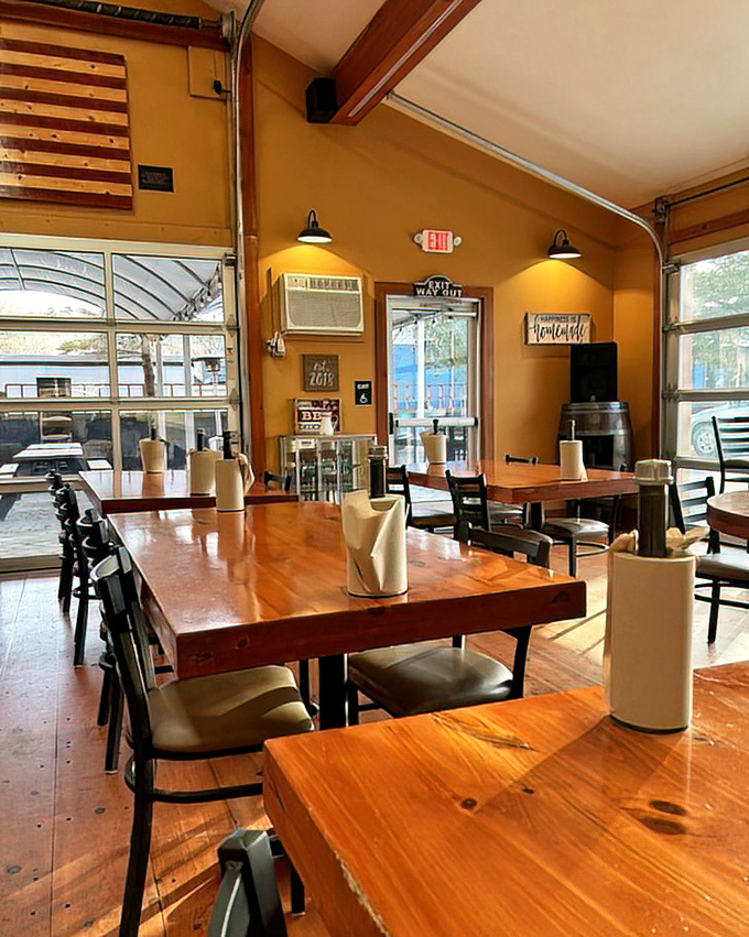 Wooden tables bathed in natural light create the perfect stage for the smoky stars of the show. Simple, honest, and ready for BBQ magic.