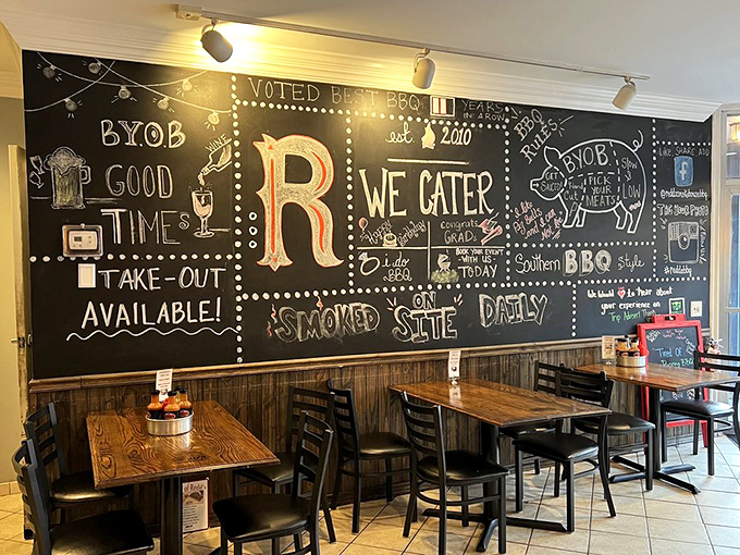 The dining area feels like the living room of that friend who always hosts the best gatherings. Rustic wood, chalkboard art, and the promise of good times. 