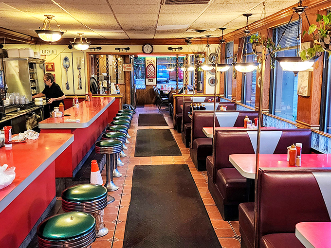 Classic diner design that hasn't changed because it doesn't need to&mdash;red counters, green stools, and the promise of comfort food just seconds away.
