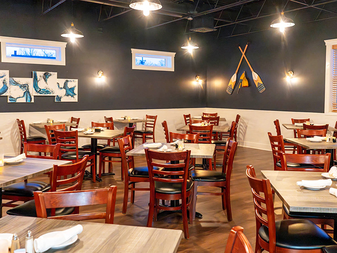 Modern nautical chic meets cozy dining. Those wooden chairs have heard thousands of "mmms" and "you've got to try this" over the years.