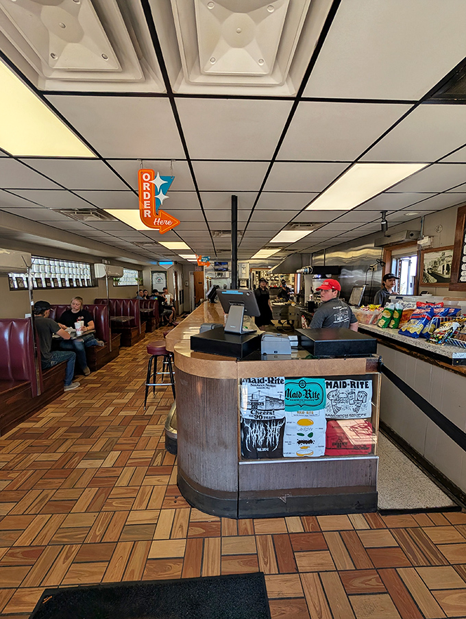 The wood-paneled dining area feels like stepping into your favorite aunt's kitchen, if your aunt could make sandwiches that inspire road trips.
