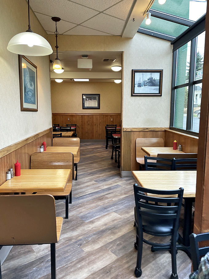 Simple wooden booths worn to a perfect patina by decades of elbows and conversations. The kind of place where memories are made between coffee refills.