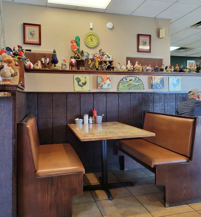 Chicken figurines stand guard over cozy booths where countless Florida mornings have begun. The breakfast sentinel collection is impressive.