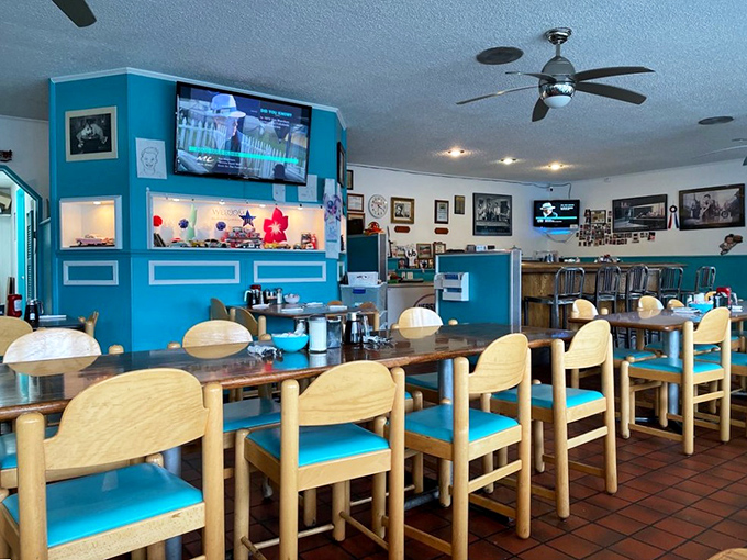 Counter seating with turquoise accents and light wood &ndash; the diner equivalent of front-row seats to the greatest show on earth: breakfast.