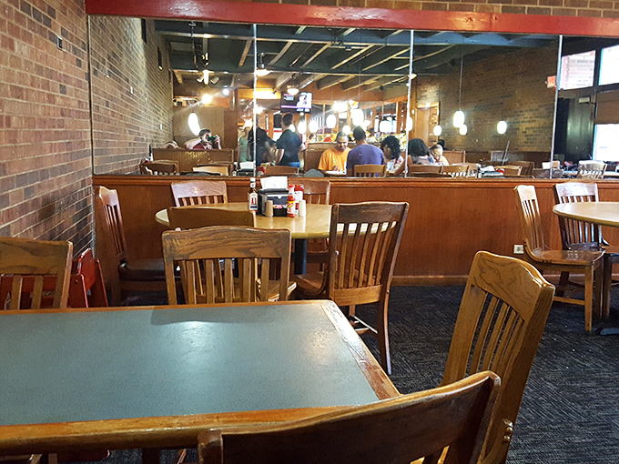 The buffet pilgrimage in progress. Notice the focused expressions&mdash;this isn't their first rodeo at Austin's legendary spread.