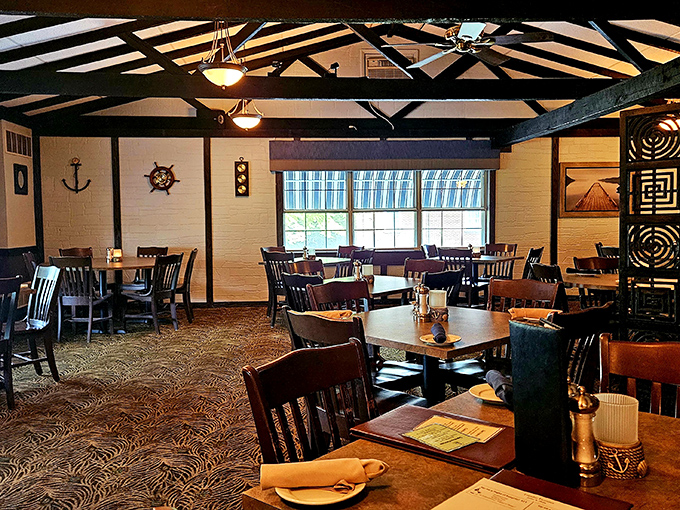 The dining room's vaulted ceiling and nautical touches create an atmosphere that's both elegant and comfortable. Like dining in a ship captain's private quarters.
