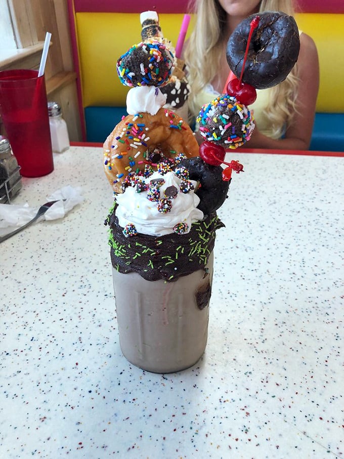 Donuts and milkshakes had a beautiful baby. This creation makes me wonder why we ever settled for drinking milkshakes without donut hats. 