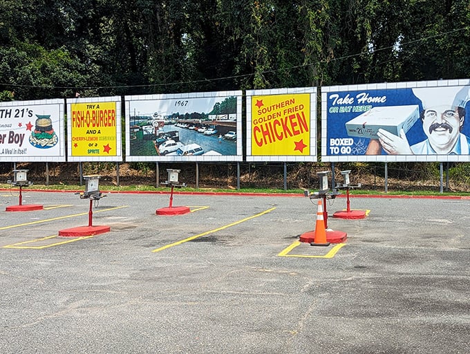 The colorful billboards stand as sentinels of simpler times, when a good burger and curbside service were all you needed for a perfect Saturday afternoon.