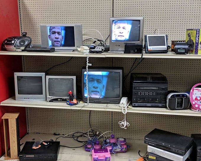 The electronics section: where yesterday's cutting-edge technology comes for its encore performance. Those TVs have stories to tell.