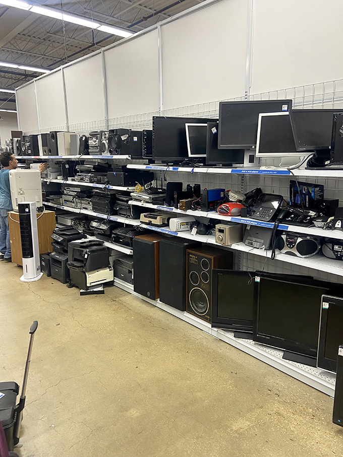 The electronics section: where vintage stereos and monitors create a museum of technological evolution that would make Steve Jobs nostalgic.