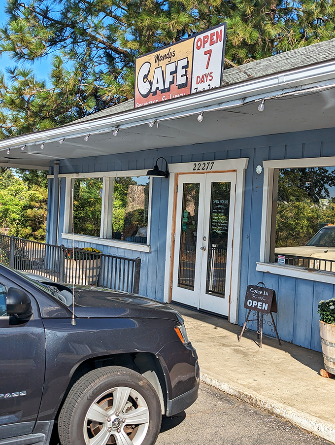 The "Open 7 Days" sign might as well read "Abandon diet, all ye who enter here"&mdash;a blue beacon of breakfast bliss.